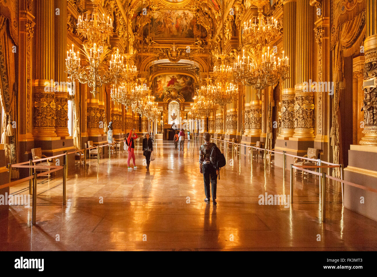Tourists in Le Grand Foyer of Palais Granier in the Paris Opera House ...