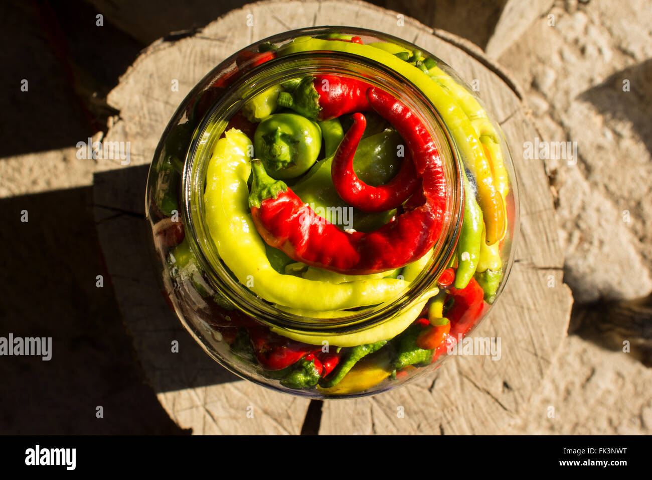 Traditional Jarred yellow, green, red, hot peppers. High resolution ...