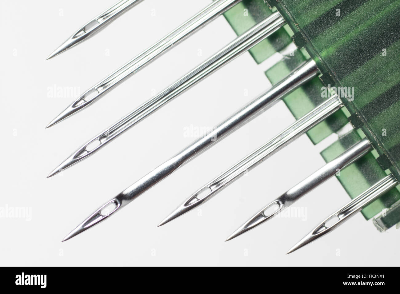 Industrial machine sewing needle. High resolution image depicting ...