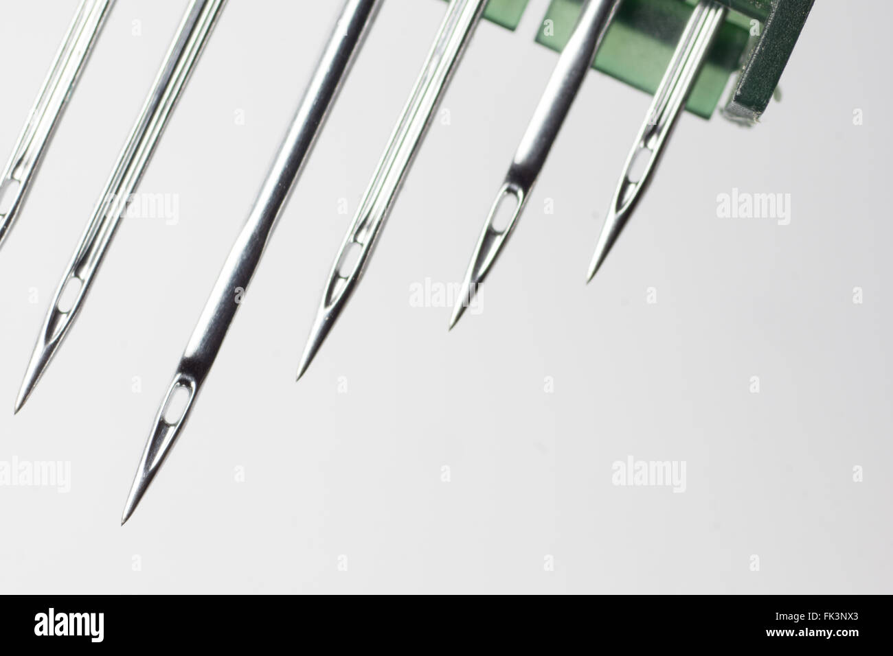 Industrial machine sewing needle. High resolution image depicting ...