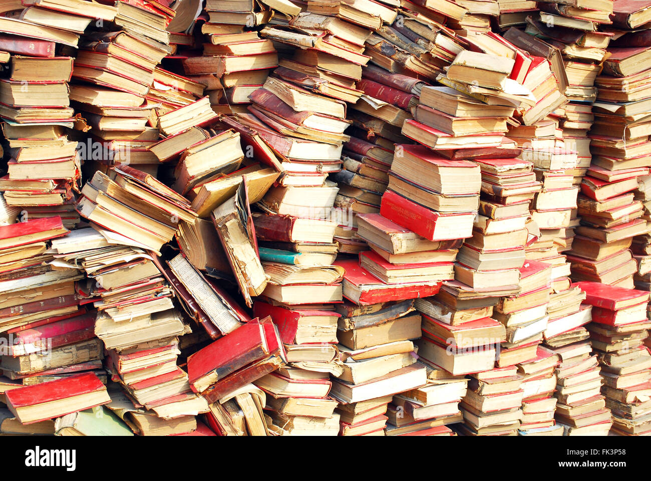 Dusty pile of book Stock Photo - Alamy