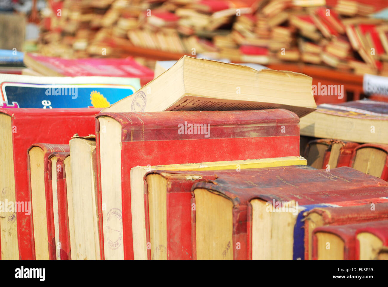 Dusty pile of book Stock Photo - Alamy