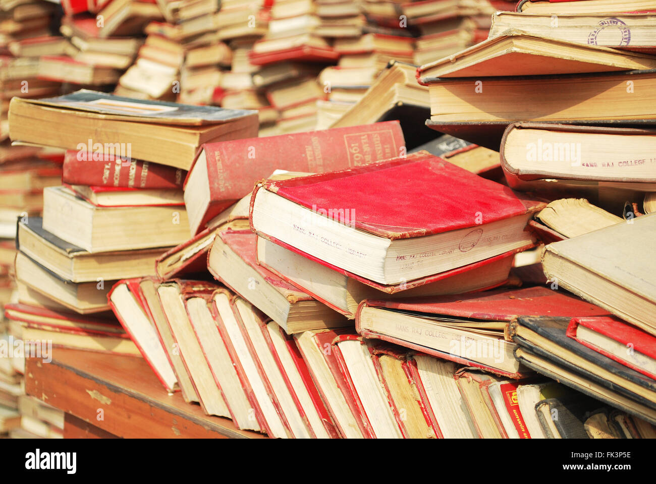 Dusty pile of book Stock Photo - Alamy