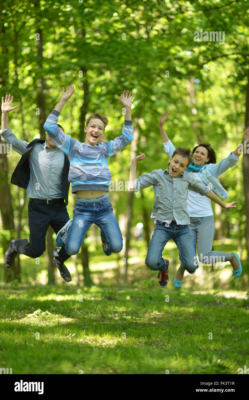 Happy family jump Stock Photo - Alamy