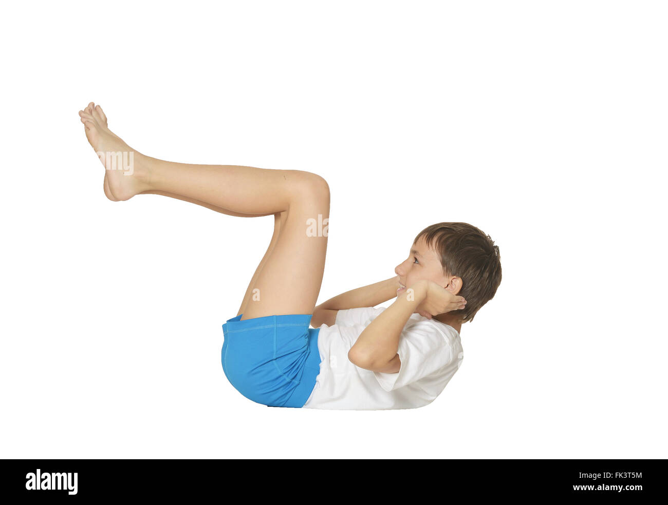 Young boy doing Stock Photo - Alamy