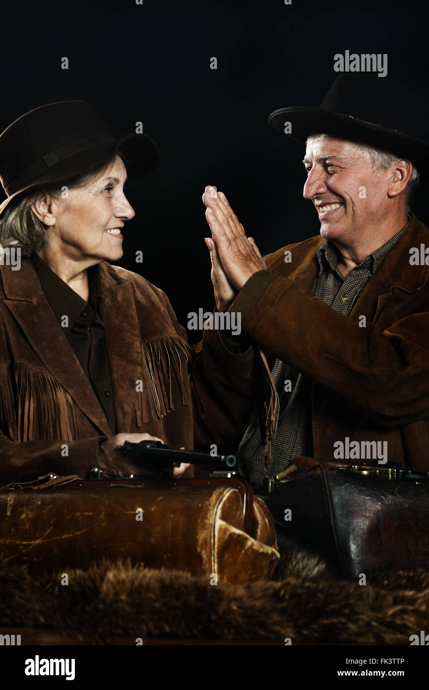 Two smiling hunter Stock Photo - Alamy