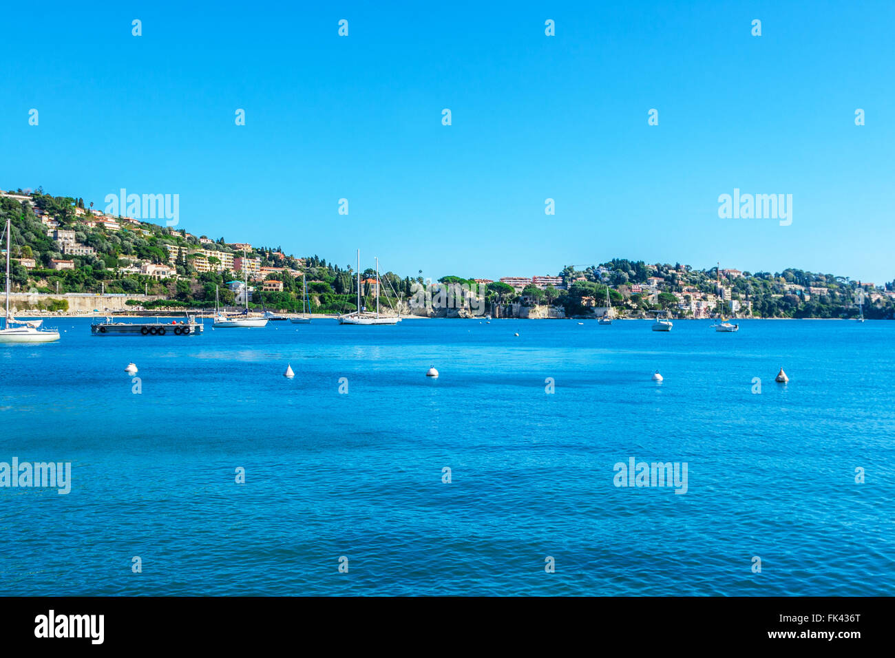 Panoramic view of coastline and beach with blue sky, luxury resort and ...