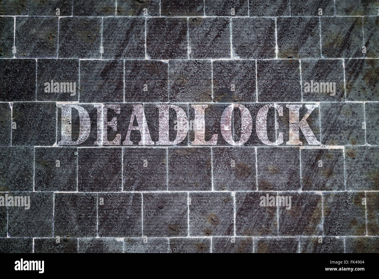 Single word Deadlock written on dark textured background Stock Photo ...