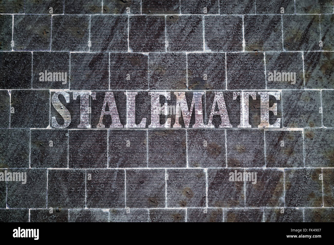 Single word Stalemate written on dark textured background Stock Photo ...