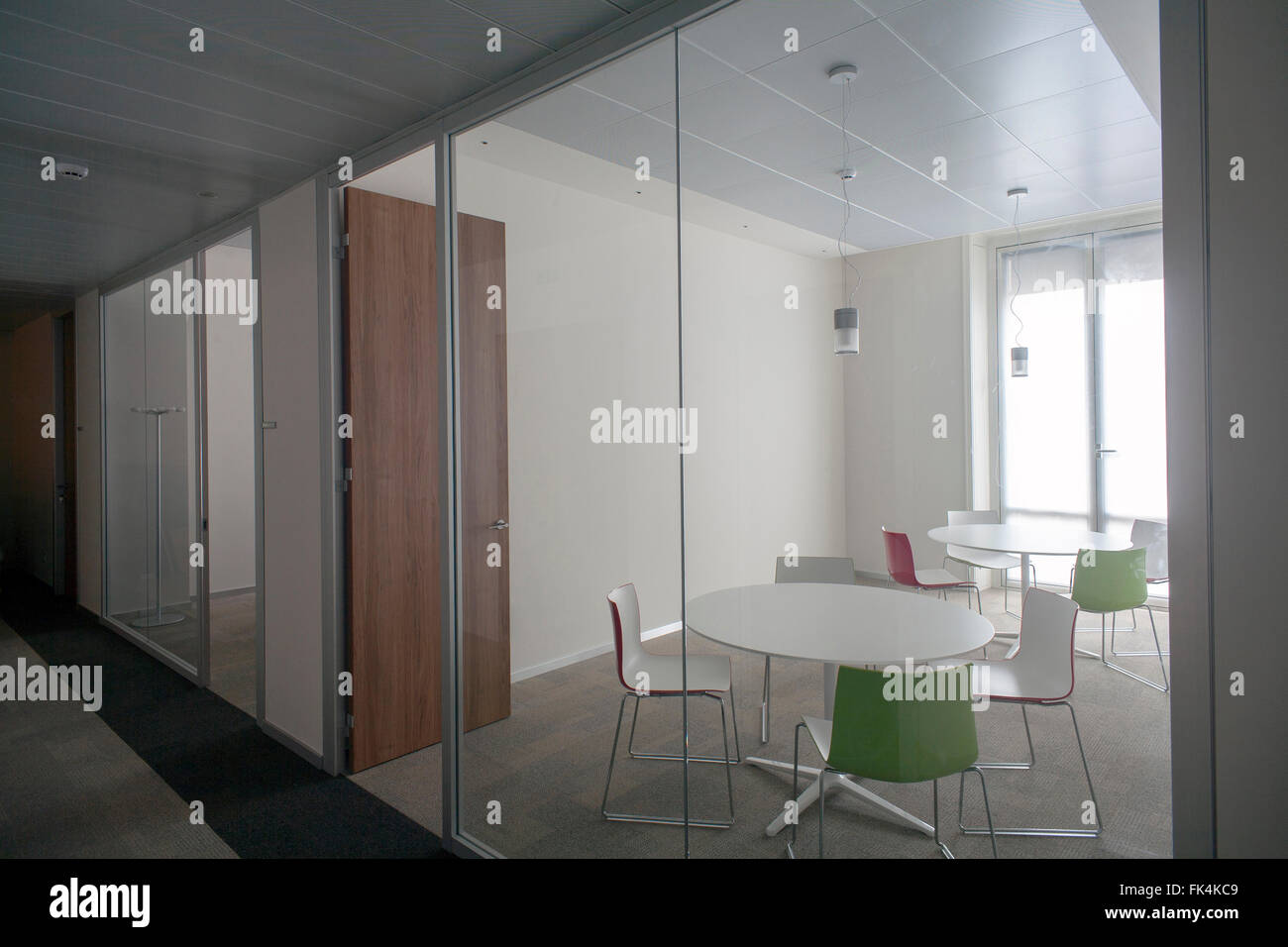 Empty office room interior with tables and chairs Stock Photo - Alamy