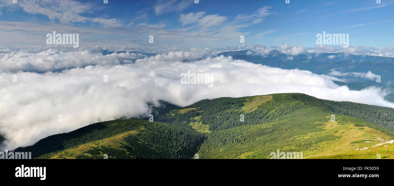 Natural cloudy valley in the mountains panorama Stock Photo - Alamy