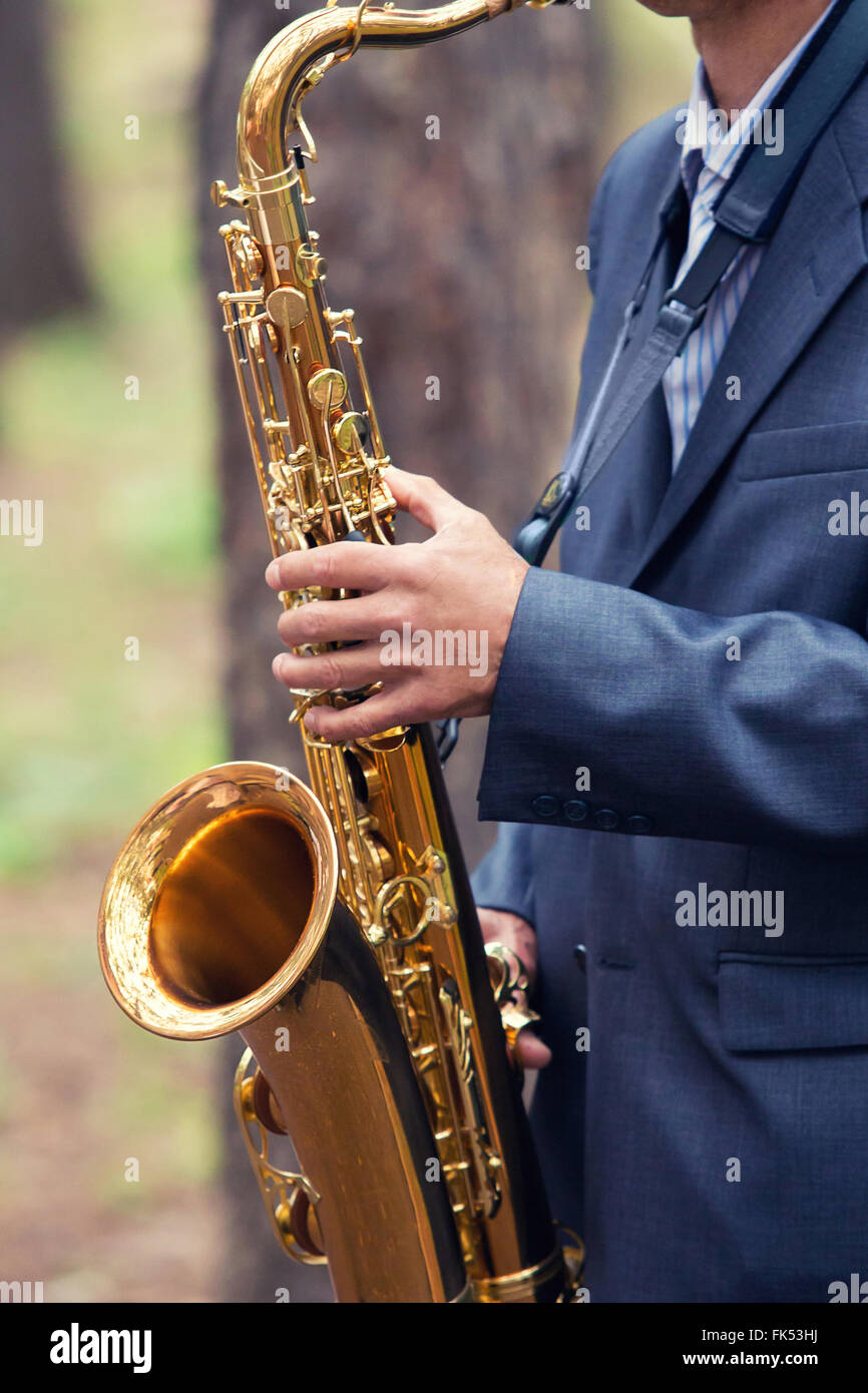 Saxophone Player at Holiday Time Stock Photo - Alamy