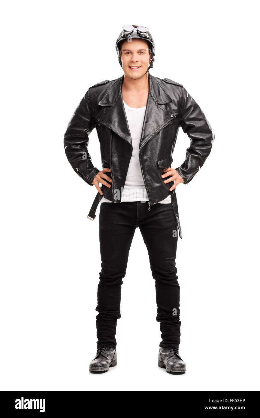 Full length portrait of a young cheerful biker in a black leather ...