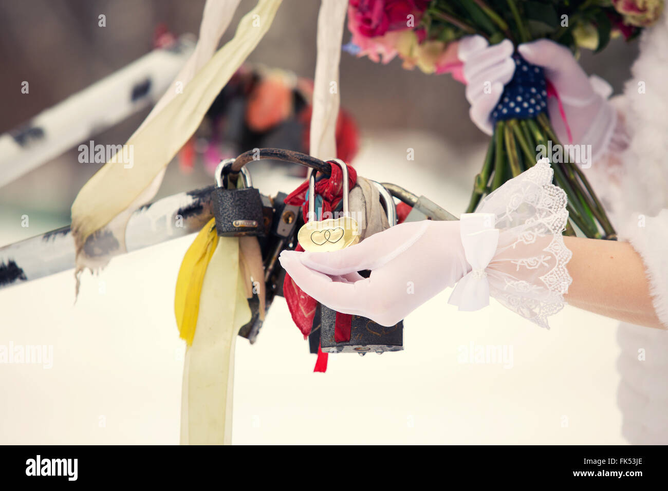 wedding lock in hands of newlyweds Stock Photo - Alamy
