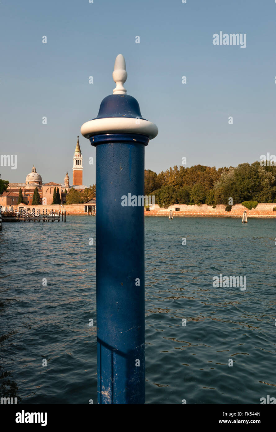 Venice, Italy. Mooring post on a canal in the Giudecca, San Giorgio ...