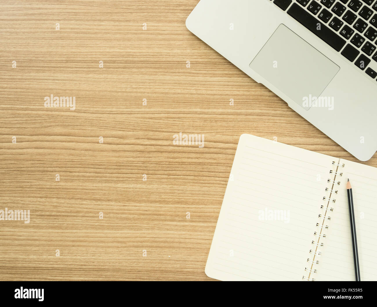 workspace with computer and notebook. View from above Stock Photo - Alamy