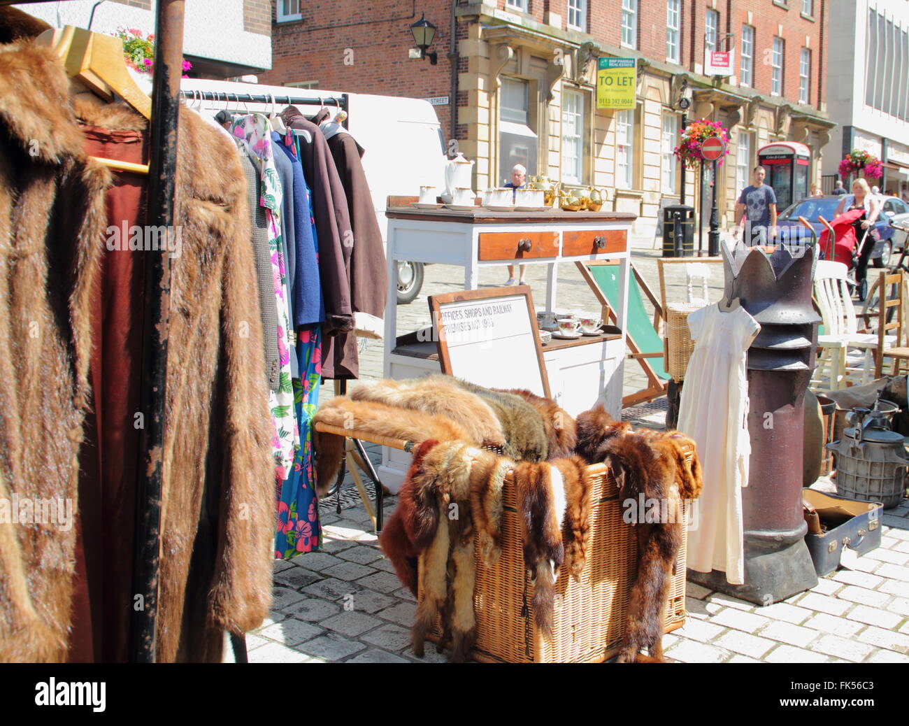 Furs for sale on a market stall at an outdoor vintage and flea market ...