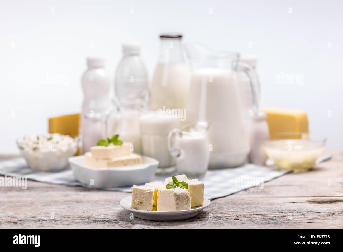 Still life with dairy products on wooden background Stock Photo - Alamy