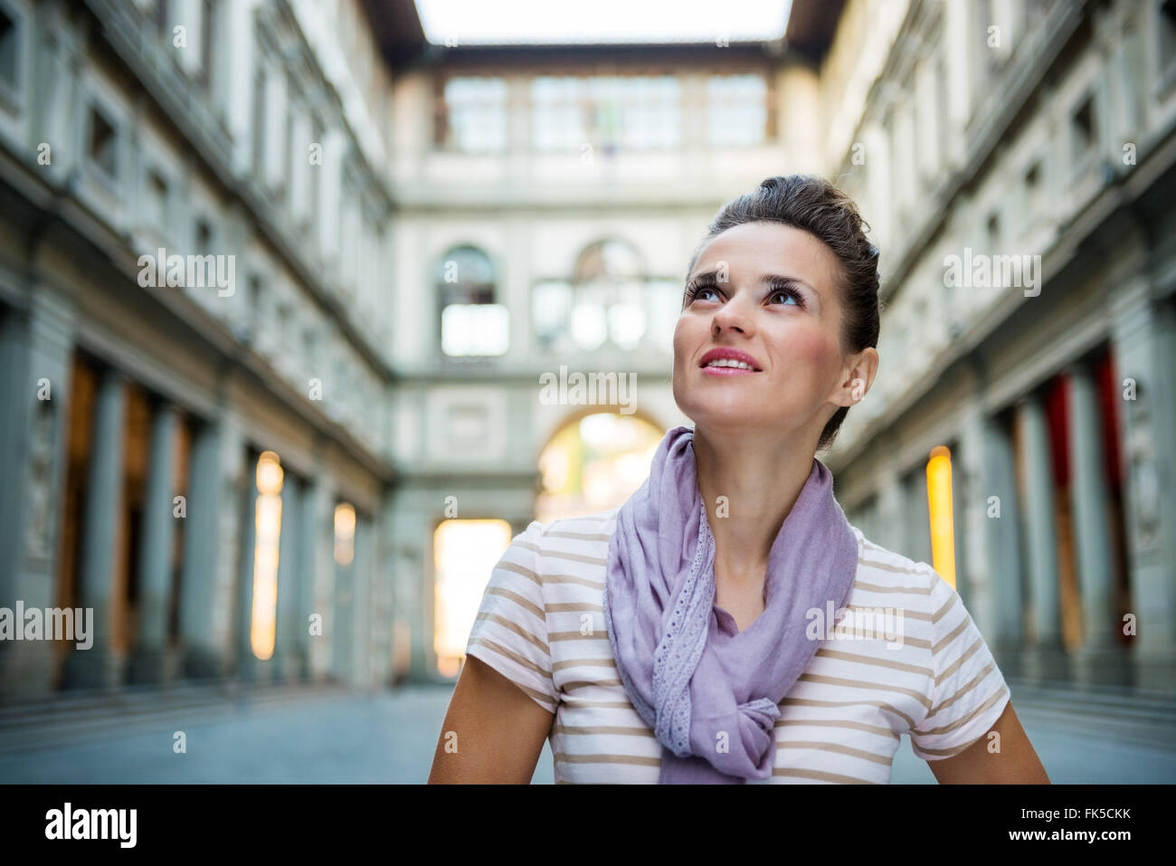 Be inspired by Uffizi Gallery. Young woman tourist sightseeing in ...