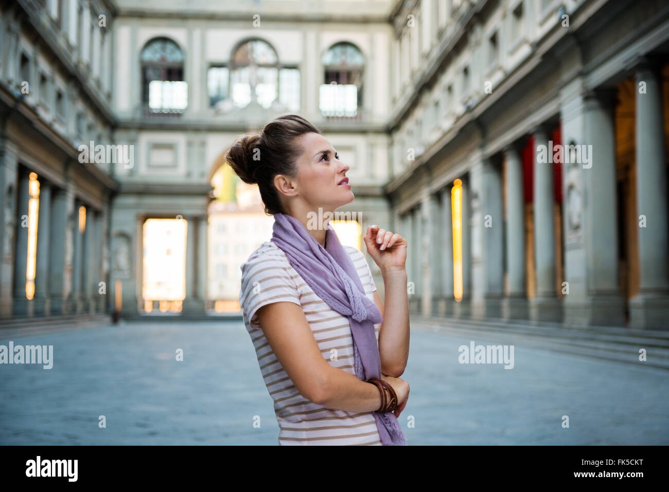 Be inspired by Uffizi Gallery. Young woman tourist sightseeing in ...