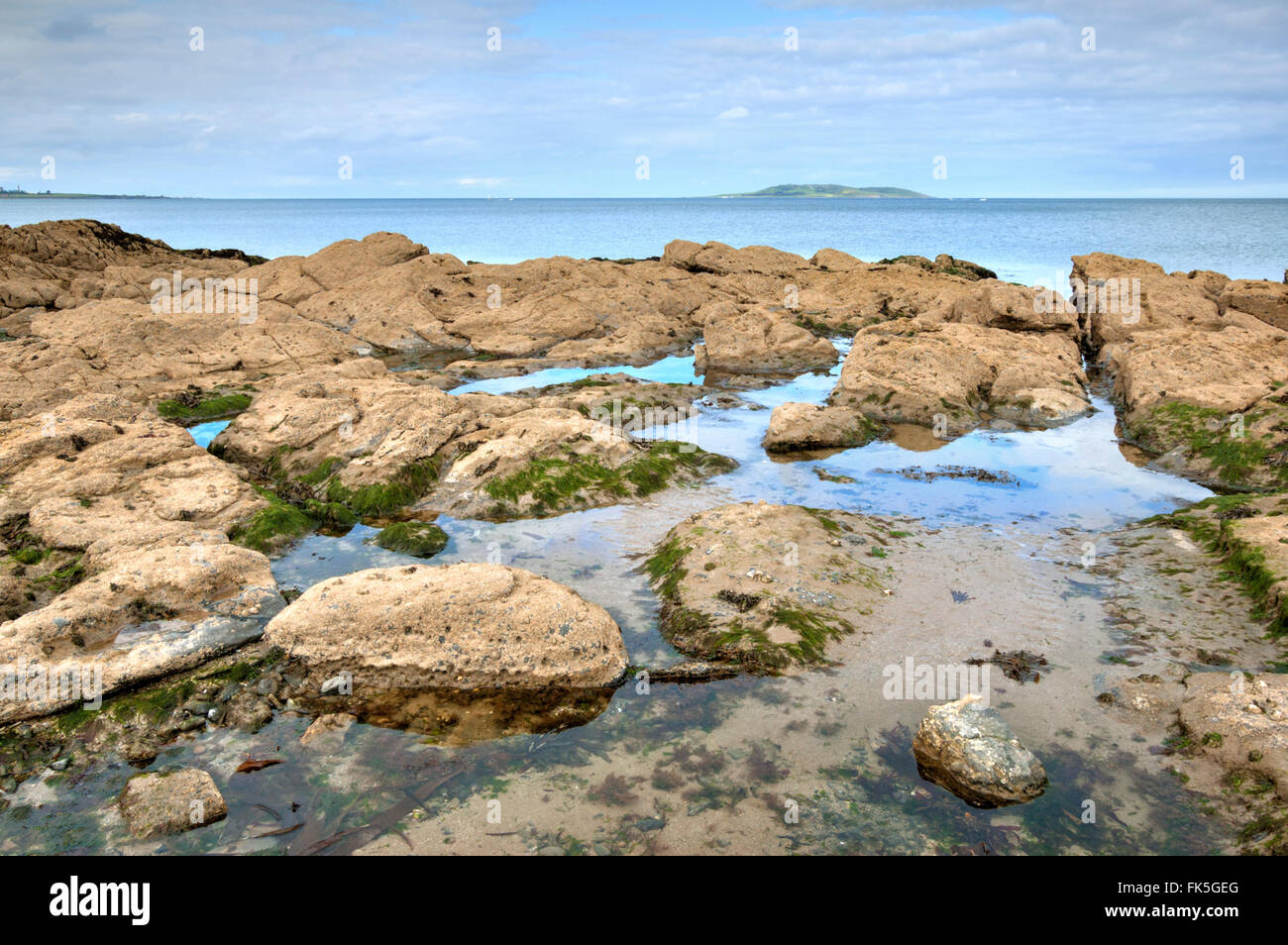 Rocky coastline and view over Irish Sea in Malahide, County Dublin ...