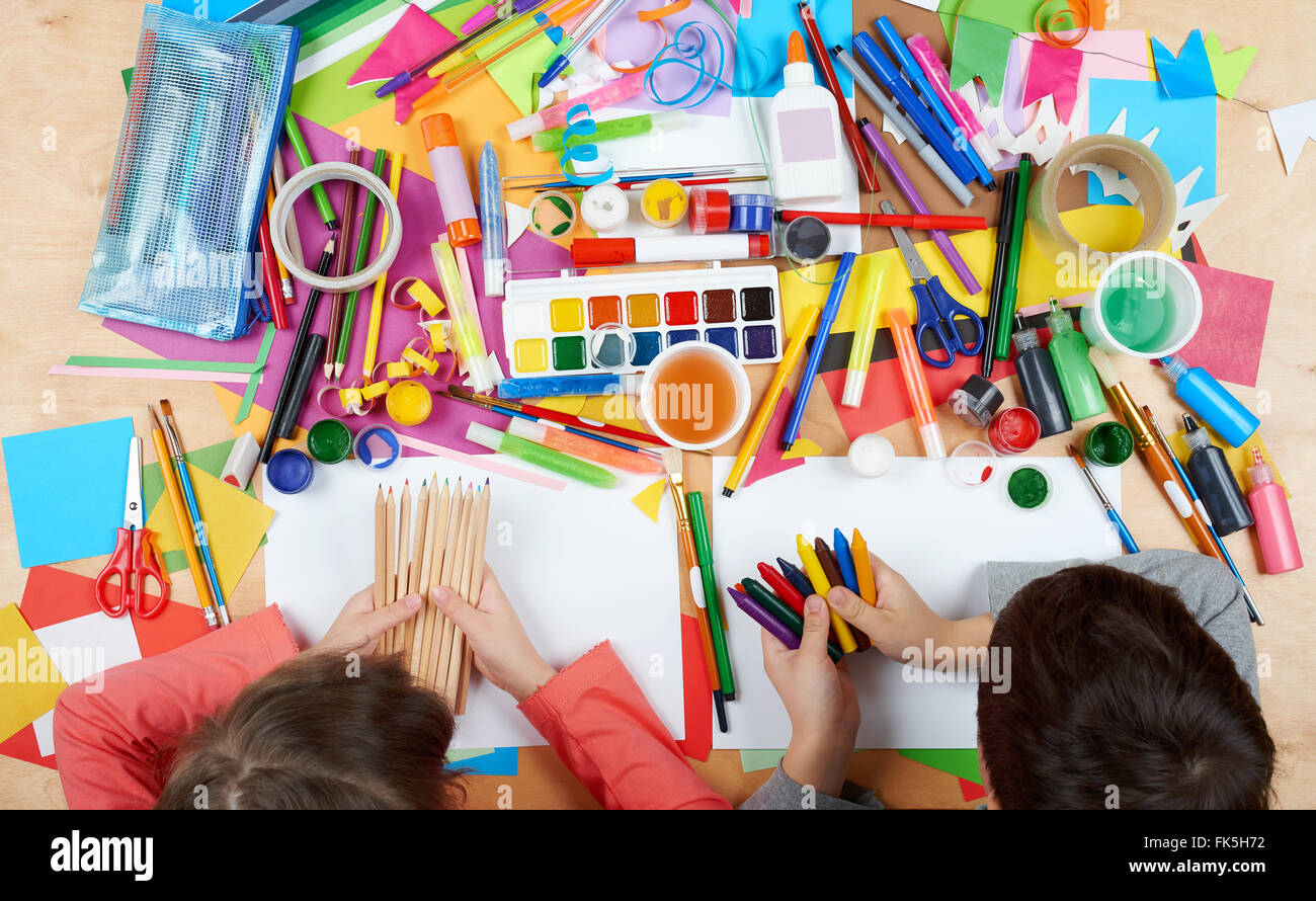 Child drawing top view. Artwork workplace with creative accessories ...