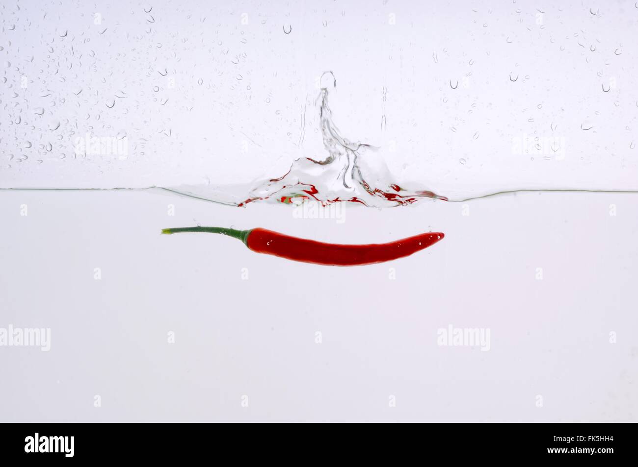 Chili pepper chilli water bubbles hi-res stock photography and images ...