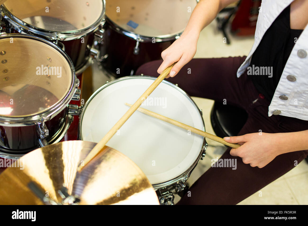 Woman playing cymbals hi-res stock photography and images - Alamy