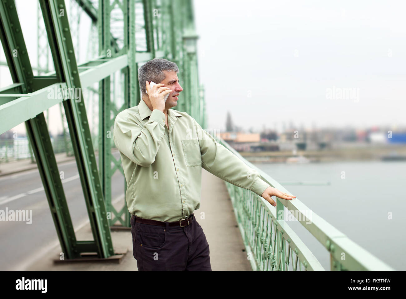 Businessman on bridge hi-res stock photography and images - Alamy
