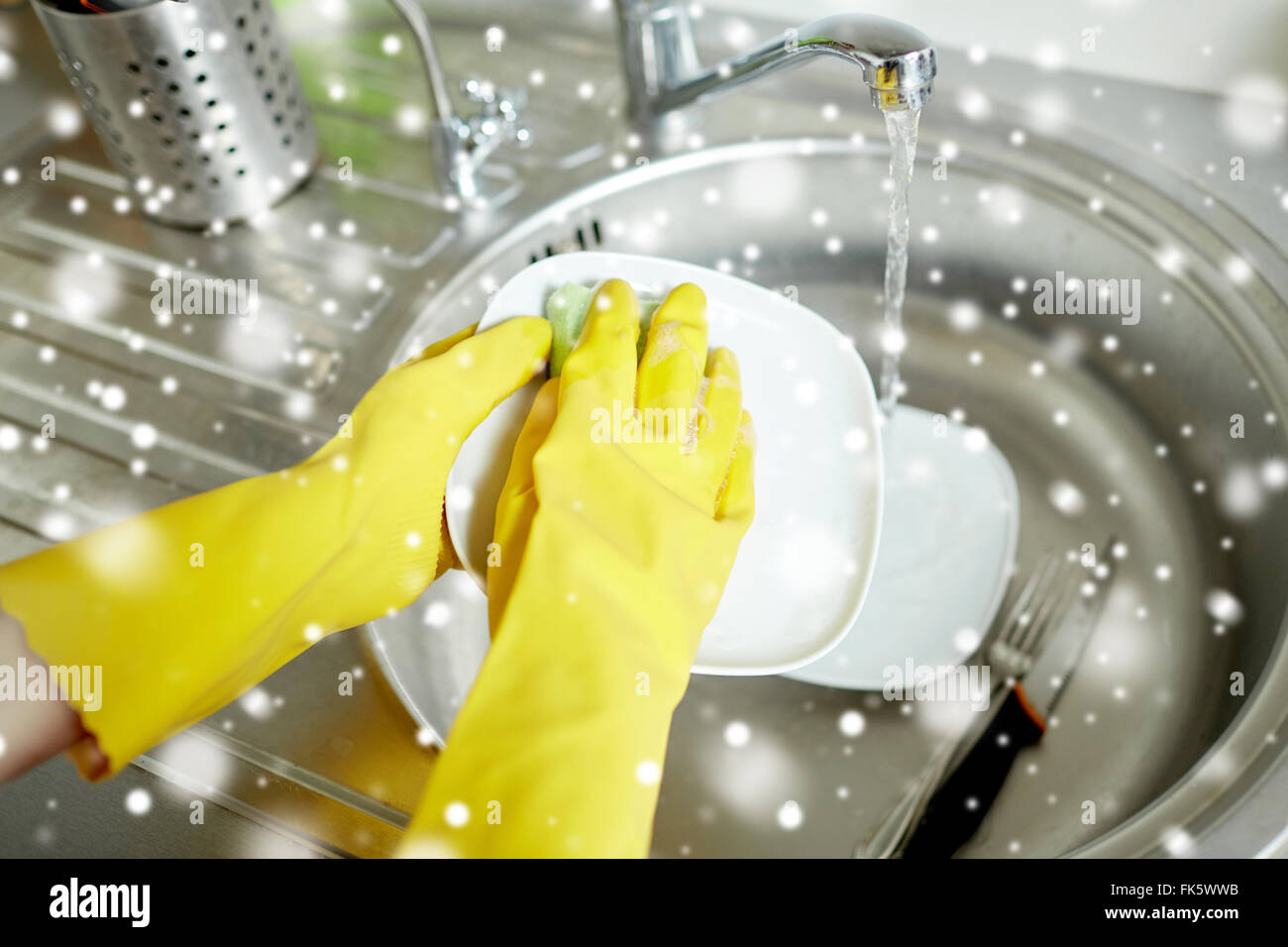Washing dishes by hand hi-res stock photography and images - Alamy