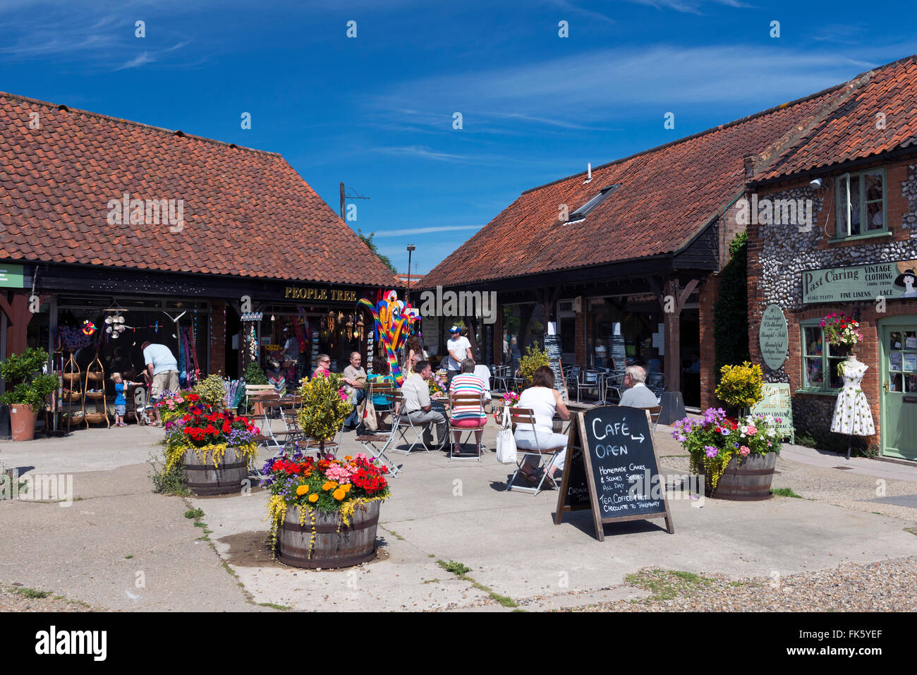 Shops and cafe in the Market town of Holt in Norfolk England Stock ...