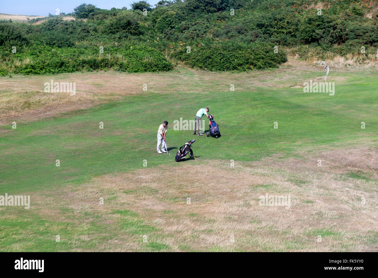 Two men playing golf hi-res stock photography and images - Alamy