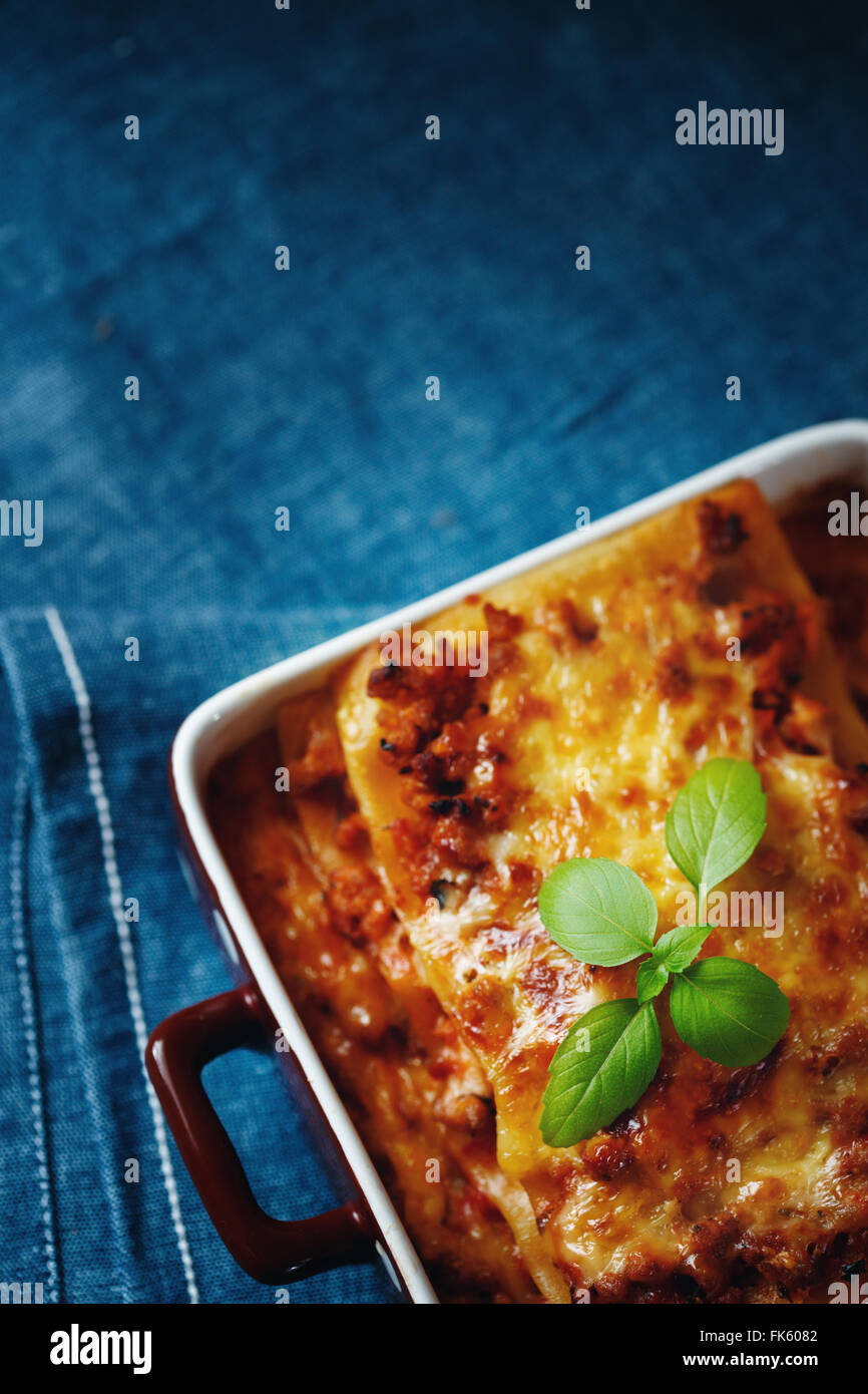 Italian Food. Top View of Hot Freshly Baked Lasagna Plate on Blue ...