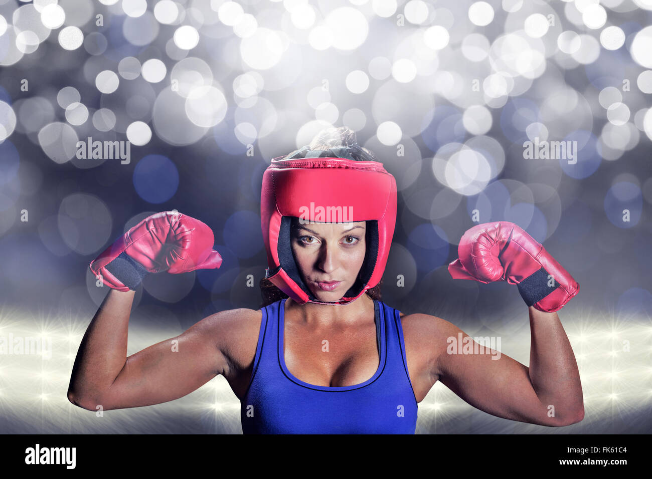 Female fighter flexing muscles hi-res stock photography and images - Alamy