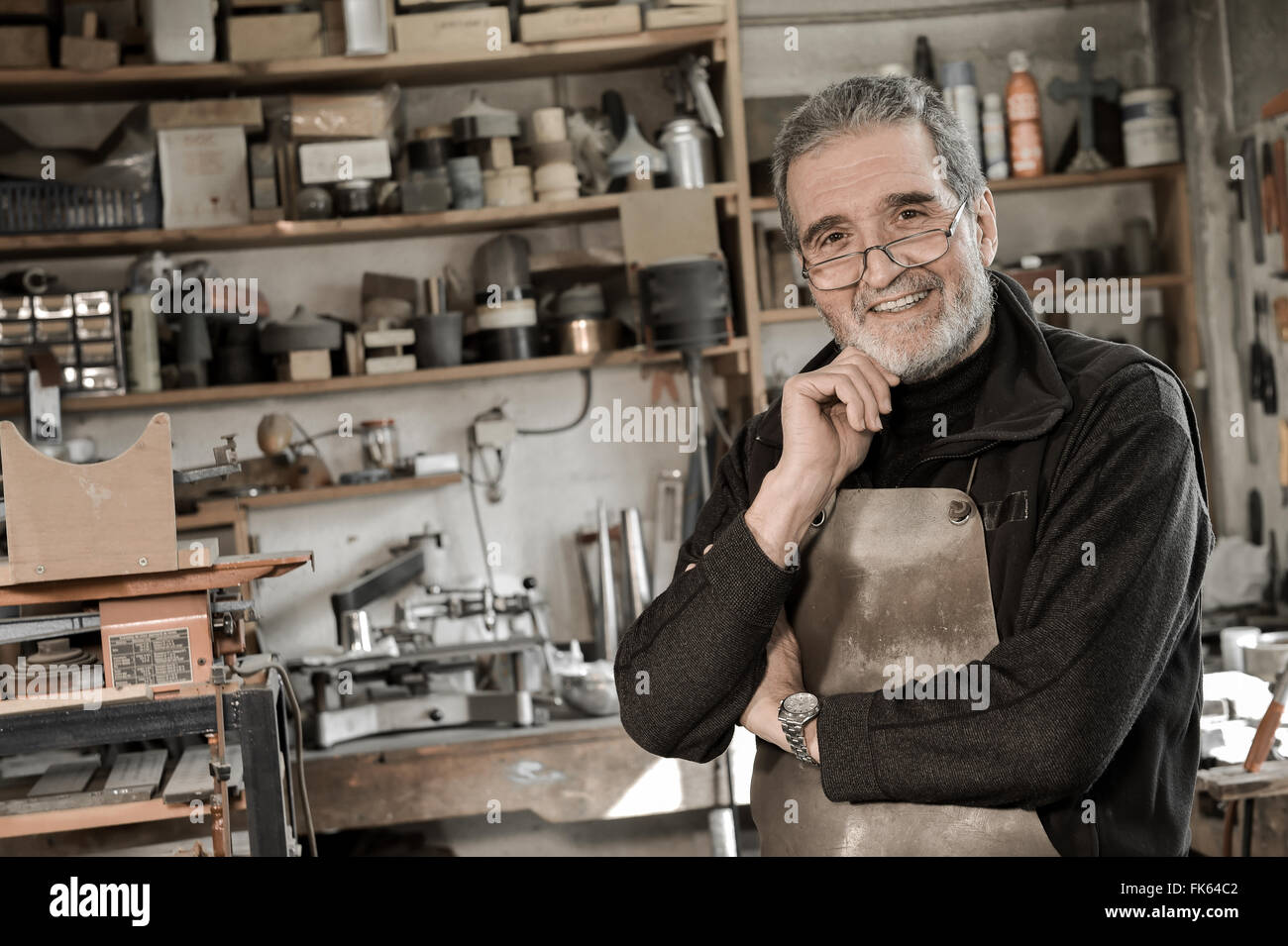 Portrait Master goldsmith working in his workshop Stock Photo - Alamy