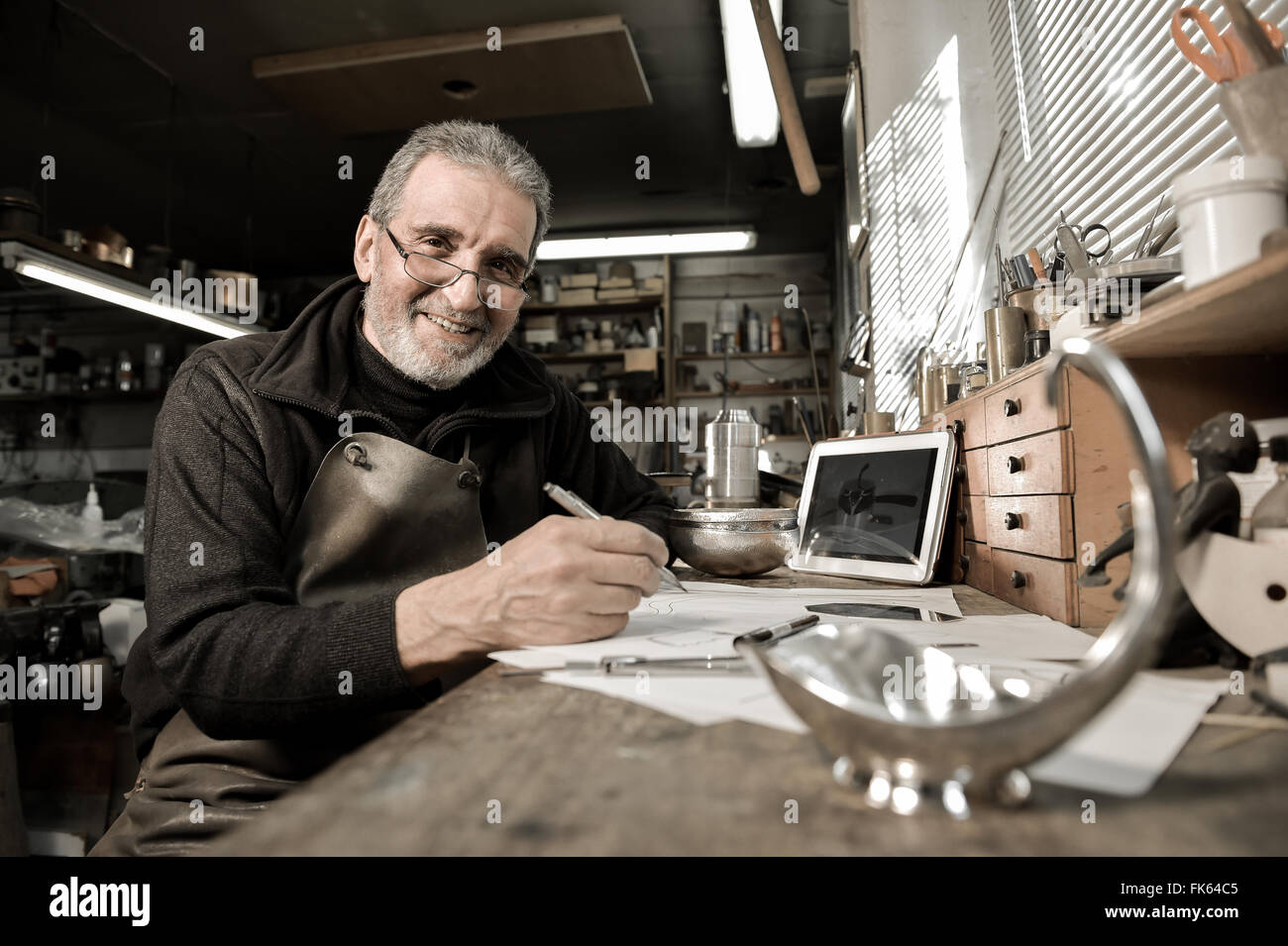 Master goldsmith working with silver-Creative drawing of a silver ...