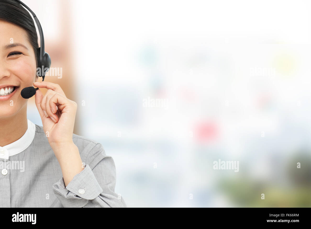 Smiling telephone agent with headset hi-res stock photography and ...