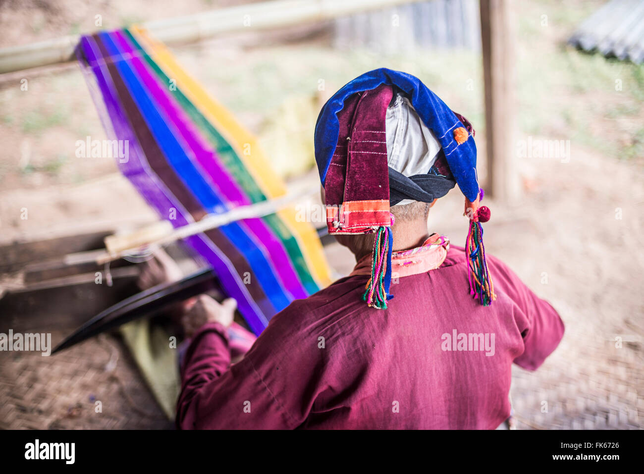 Palaung woman weaving, part of the Palau Hill Tribe near Hsipaw ...
