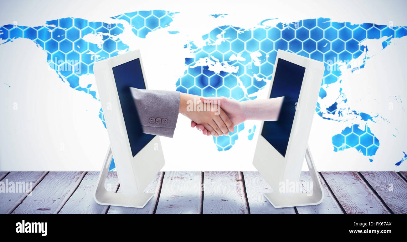 Composite image of handshake between two women Stock Photo - Alamy