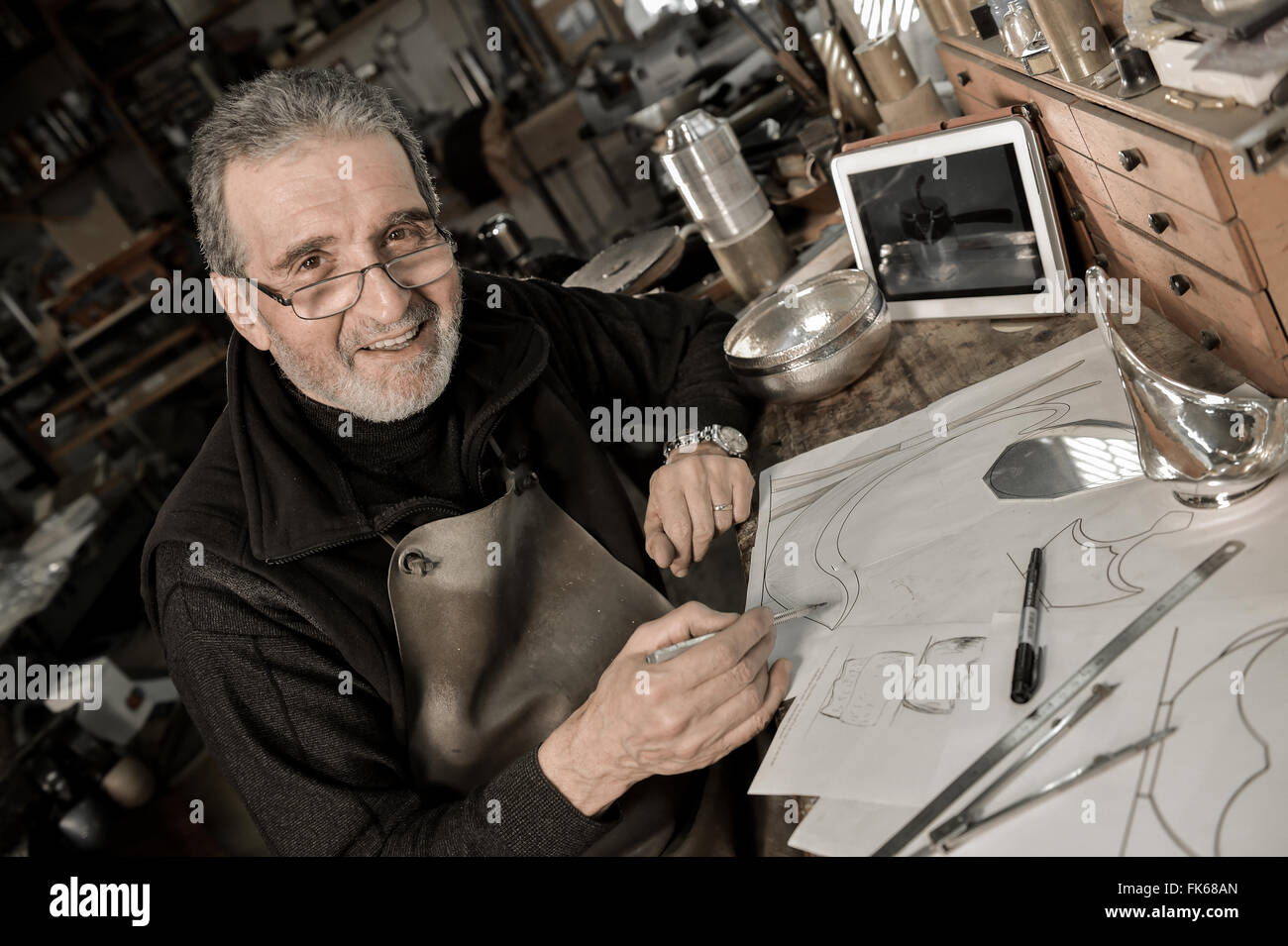 Master goldsmith working with silver-Creative drawing of a silver ...