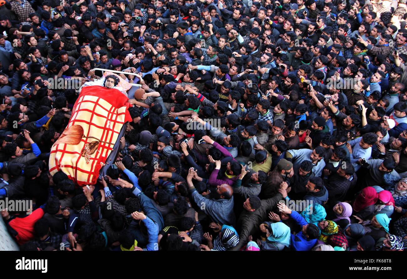 Tral, India. 07th Mar, 2016. Kashmiri Muslims carry the dead body of ...