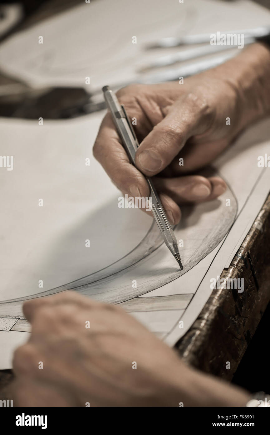 Master goldsmith working with silver-Creative drawing of a silver ...