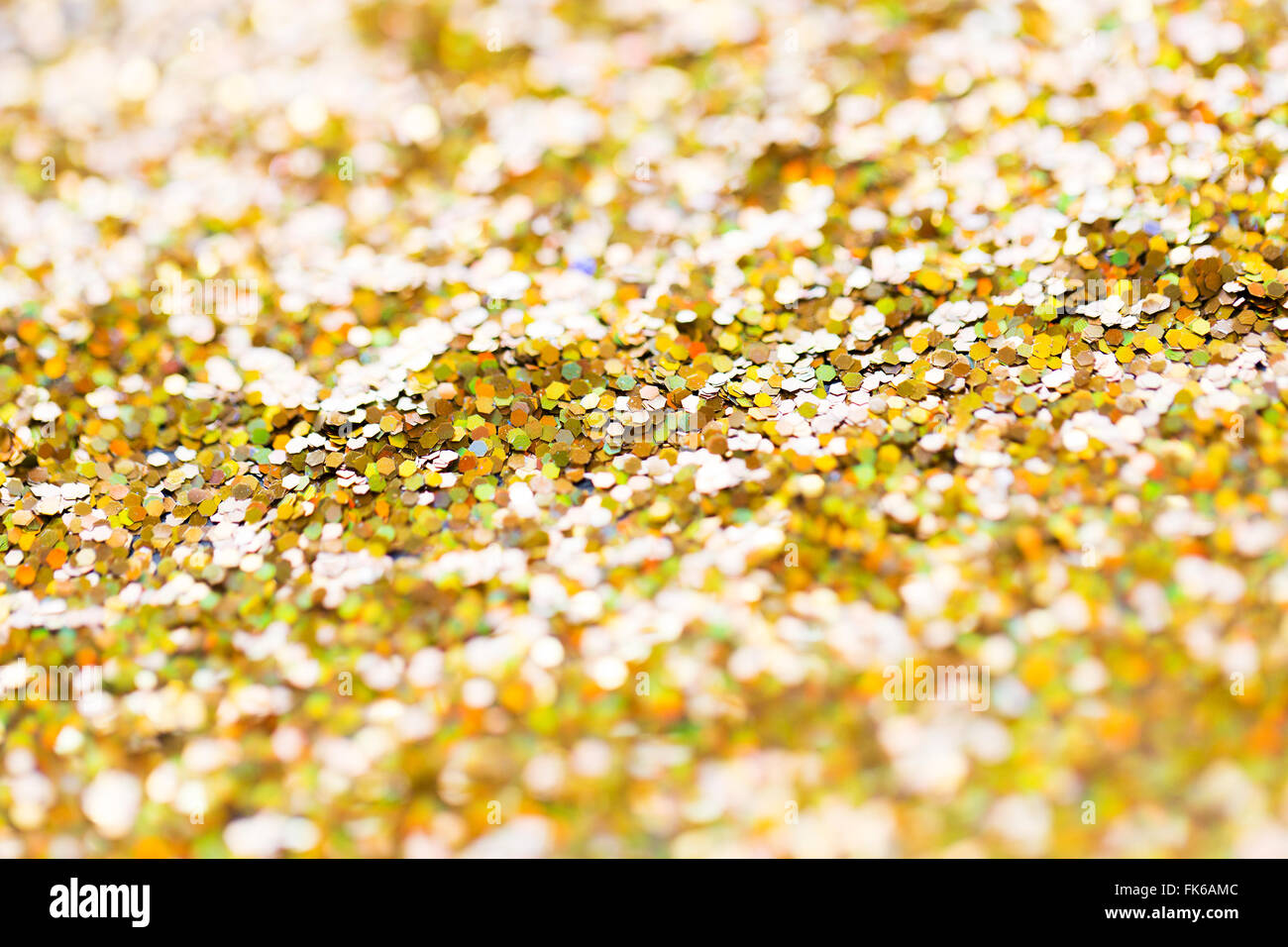 golden glitter or yellow sequins background Stock Photo - Alamy