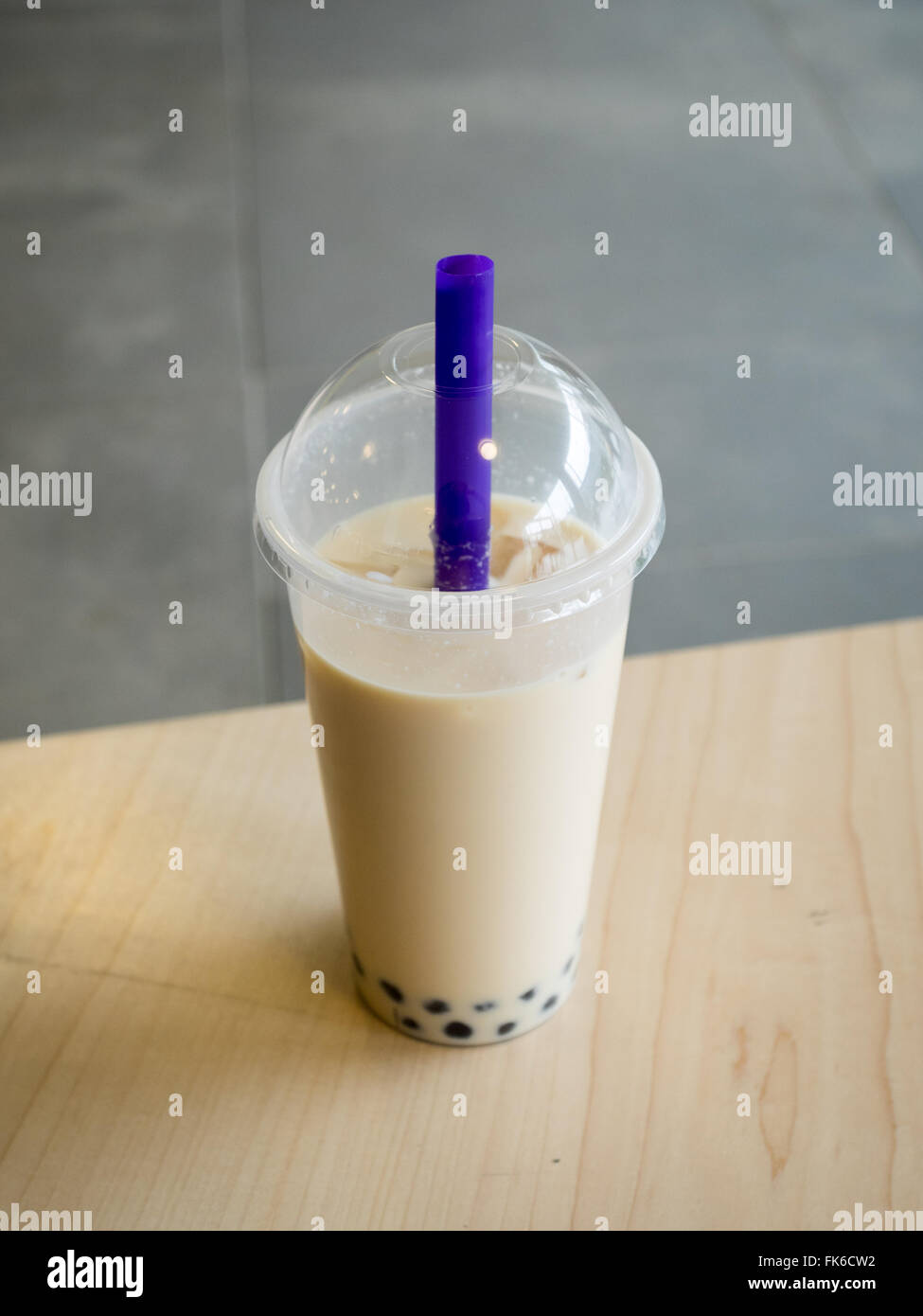 A bubble tea (pearl milk tea) with tapioca balls Stock Photo - Alamy