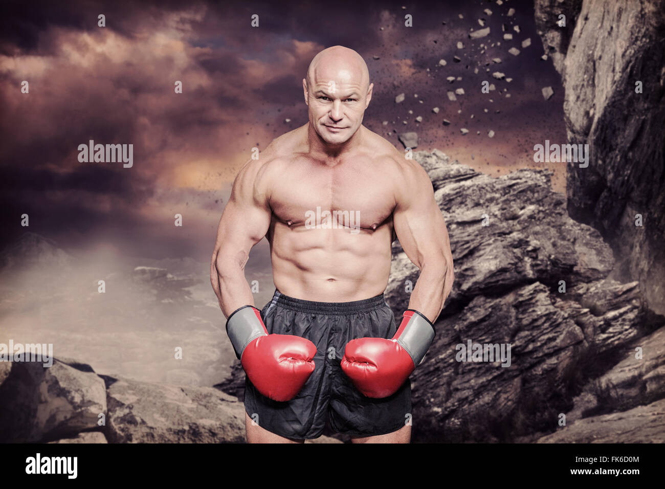 Composite image of portrait full length of bald boxer flexing muscles ...