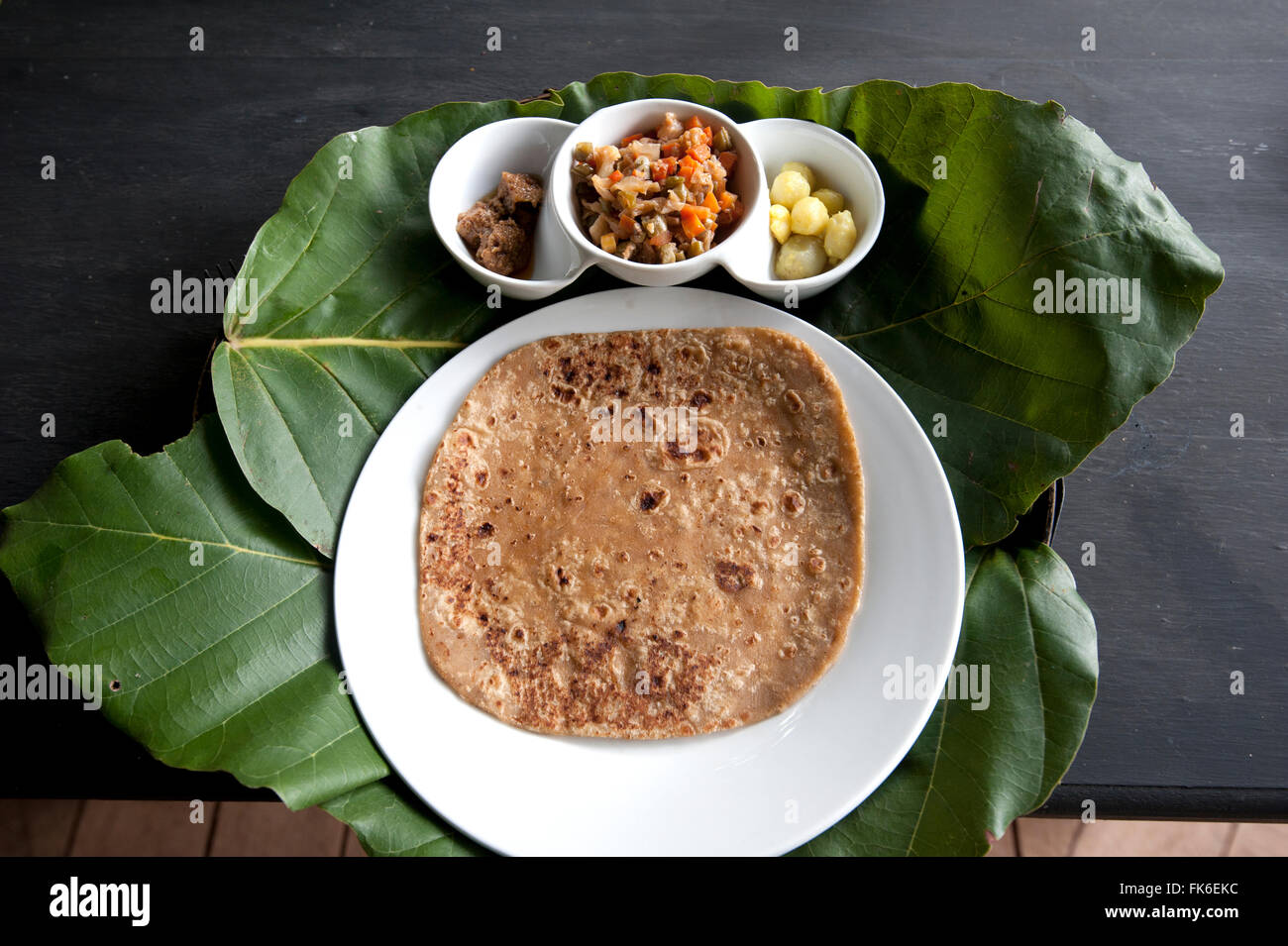 Chapati with curry hi-res stock photography and images - Alamy