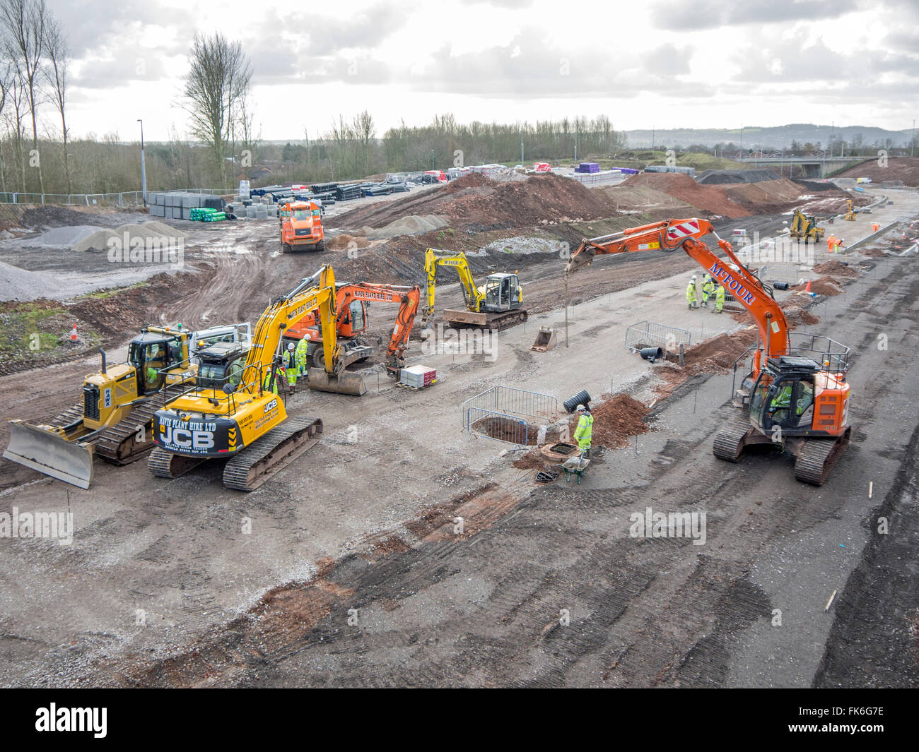 Lots of diggers on a construction site Stock Photo - Alamy