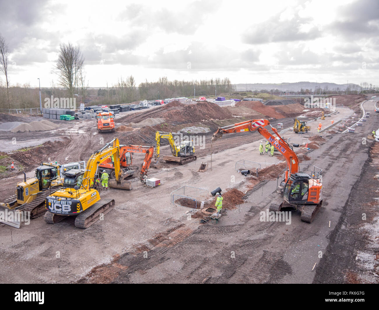 Lots of diggers on a construction site Stock Photo - Alamy