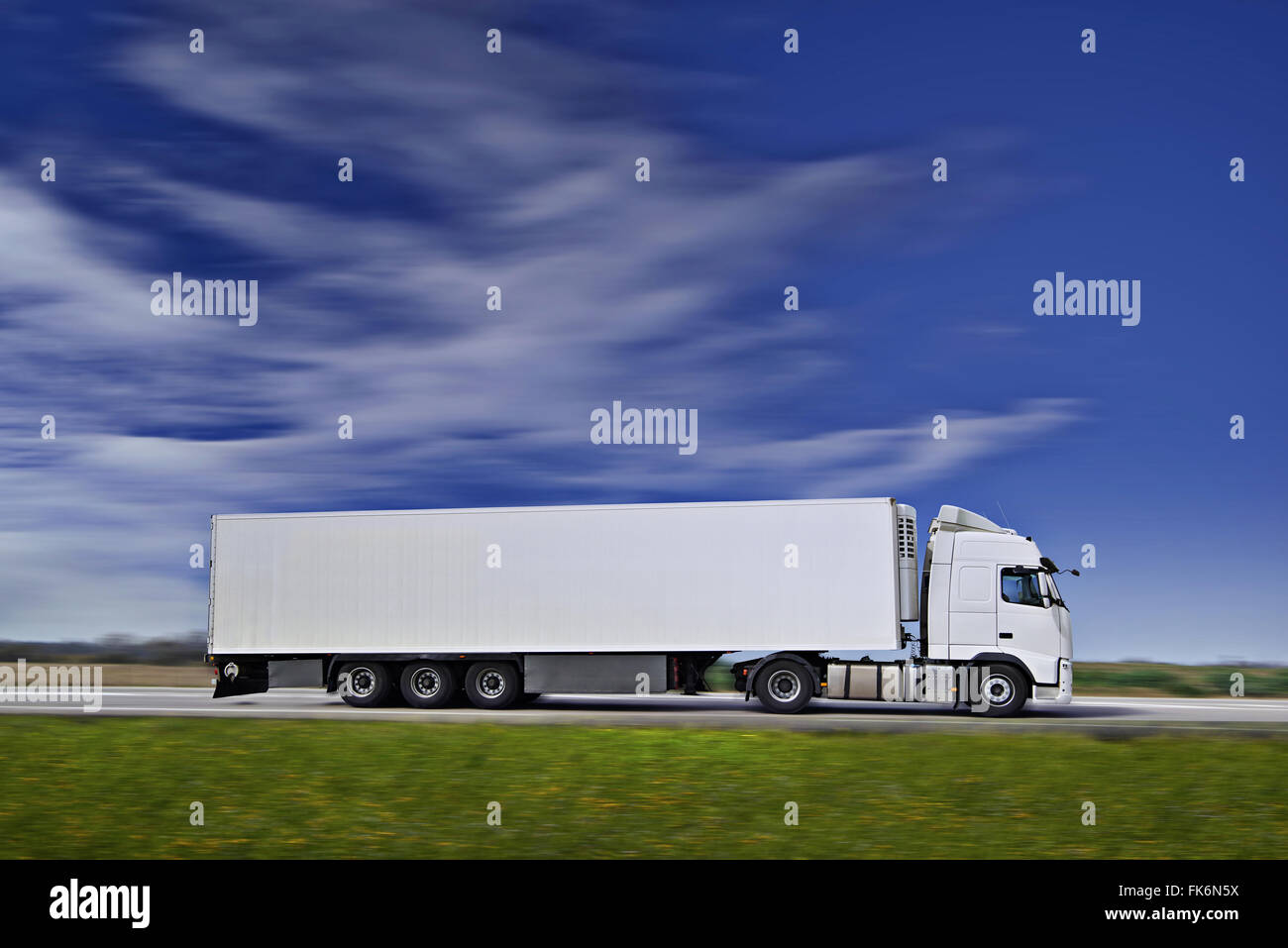 white semi truck on highway Stock Photo - Alamy