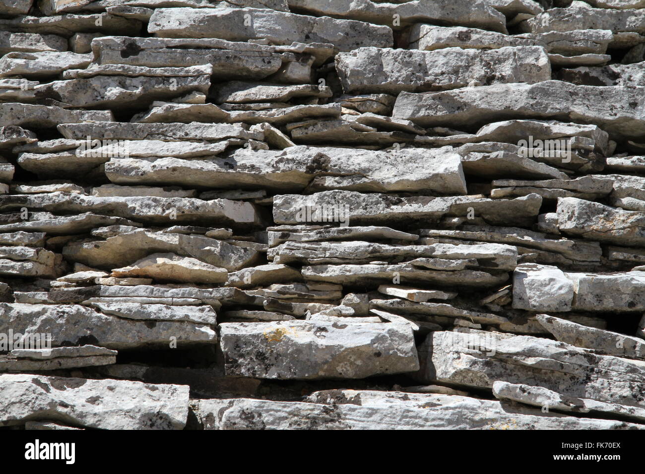 Stone wall in Italy Stock Photo - Alamy